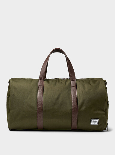 Novel forest-green duffle bag | Herschel | Men's Weekender Bags Online ...